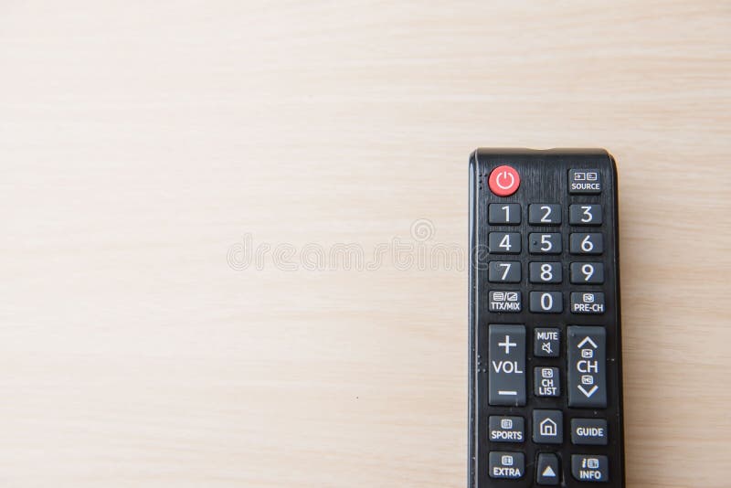 Closeup Black Remote Control on the Wood Background Stock Image - Image ...
