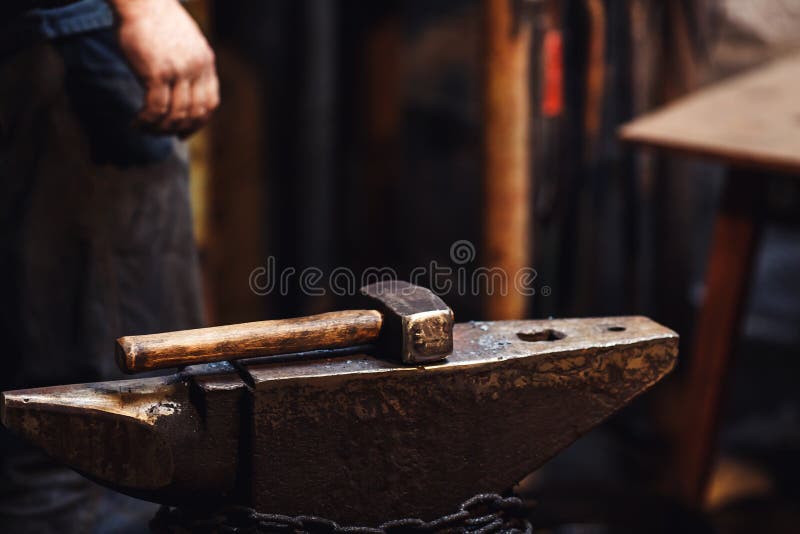 Closeup of a Blacksmith`s Hammer on the Anvil. Stock Image - Image of ...