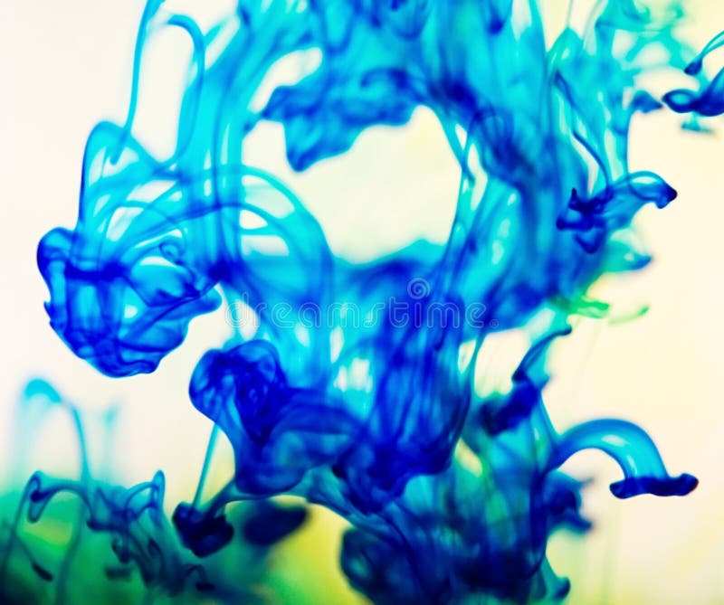 A Closeup of Blue Dye Creating a Unique Pattern in Water. Stock Image ...