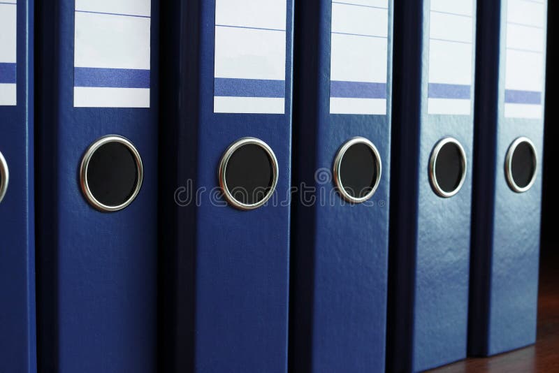 Closeup of Blue File Binders in a Row on a Shelf Stock Photo - Image of ...