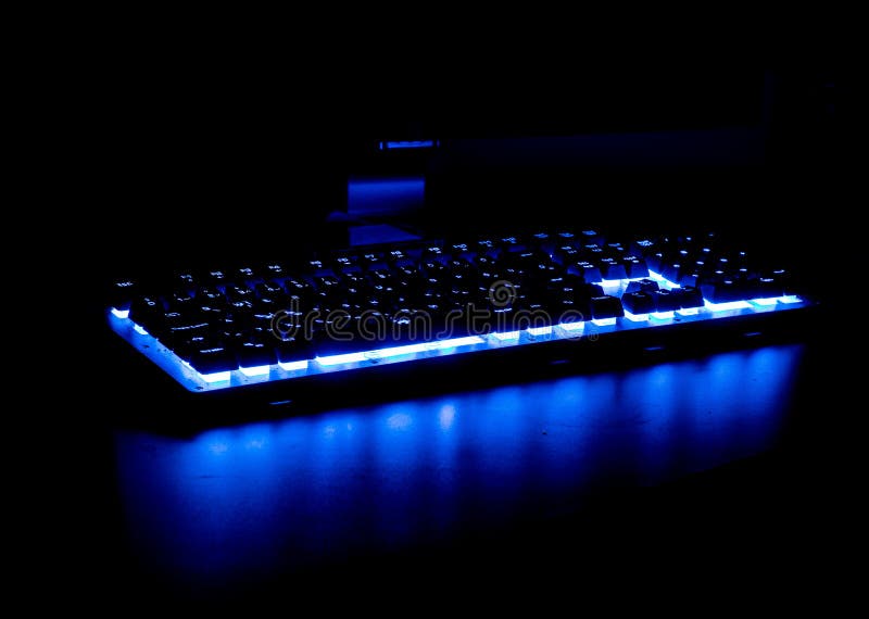 Closeup of a Blue LED-lit Keyboard in a Dark Room Stock Image - Image ...