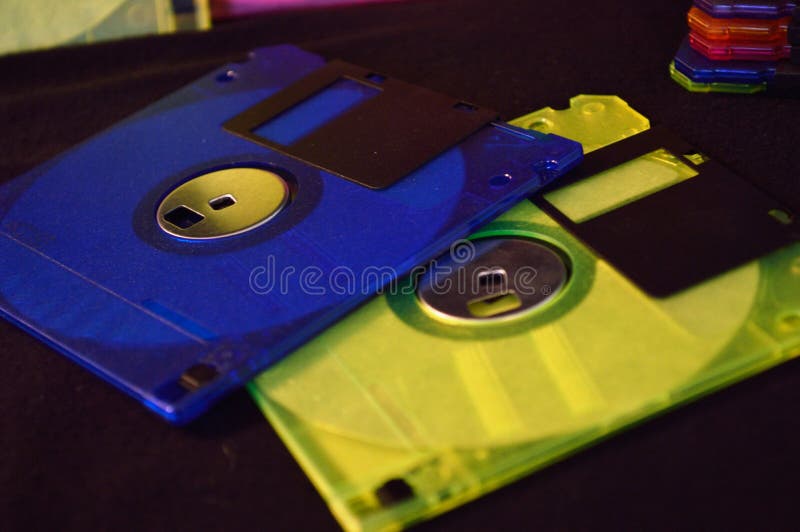 Closeup of Blue and Yellow Green Floppy Disk Stock Image - Image of ...