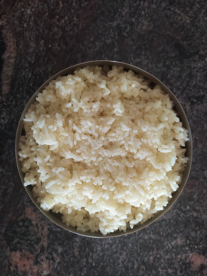 Closeup of Boiled Rice in a Bowl Isolated on a Floor Stock Photo ...
