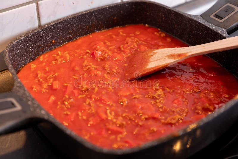 Closeup of Boiling Chopped Tomatoes Sauce in a Pan Stock Photo - Image ...