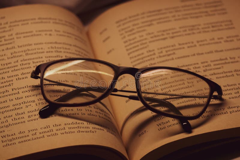 Closeup Of A Book With Glasses On It Stock Image Image Of Read Concept 207191039