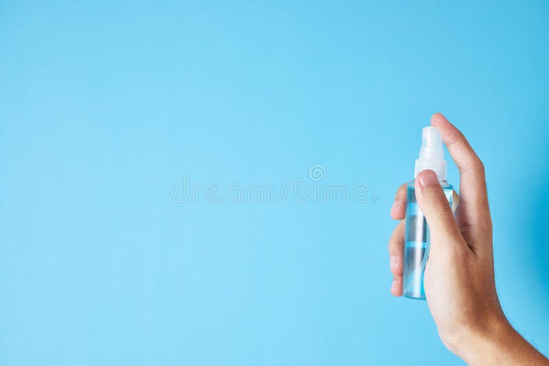 Closeup Bottle of Blue Alcohol Hand Spray Stock Photo - Image of ...