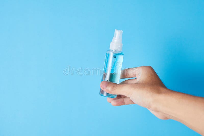 Closeup Bottle of Blue Alcohol Hand Spray Stock Image - Image of ...