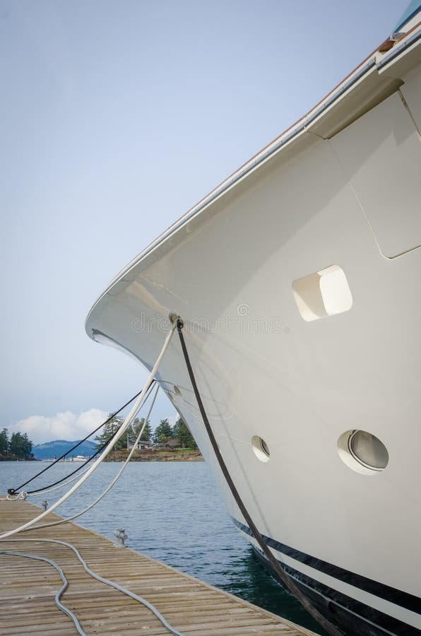 Bow of Yacht Moored at a Dock in a Harbor Stock Photo - Image of marine ...