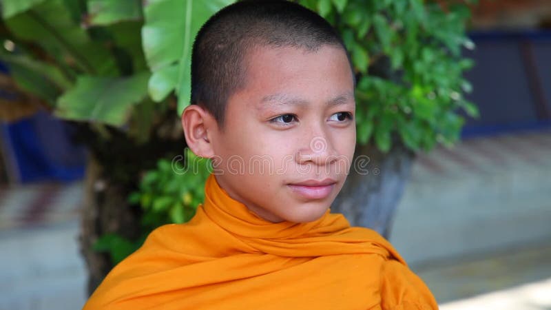Closeup of boy monk. stock footage. Video of buddhism - 38680650