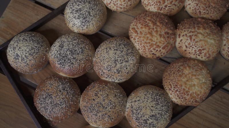 Closeup of Bread Buns with Sesame Seeds, a Top View Stock Video - Video ...