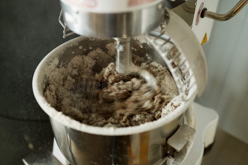Closeup for Bread Making Process by Using Flour Mixing Machine in ...