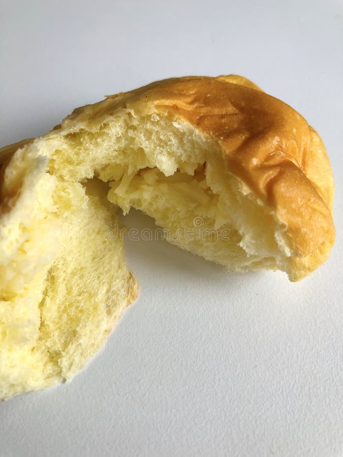 Closeup of Bread on White Table Stock Photo - Image of buttercream ...