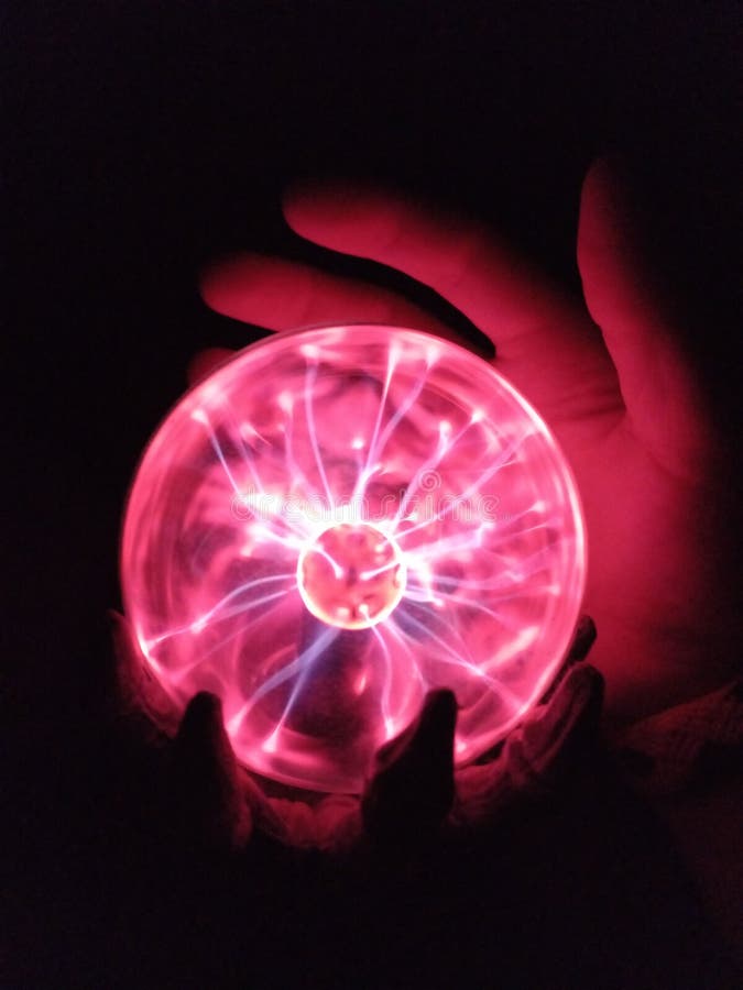 Closeup of a Bright Plasma Globe with a Hand Touching it. Stock Photo ...