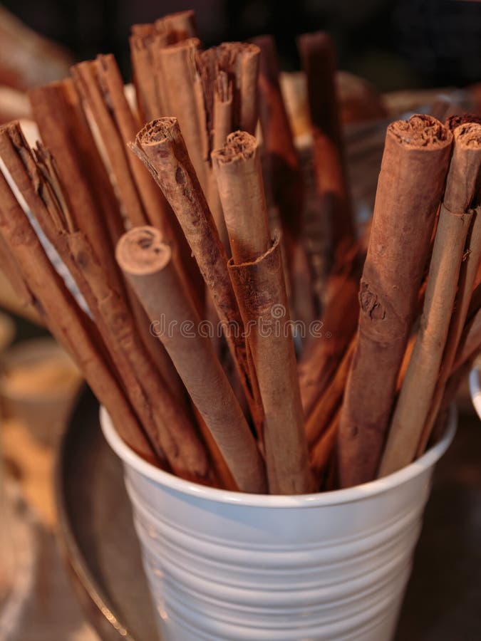 Closeup of Brown Cinnamon Sticks Inside White Container Stock Photo ...