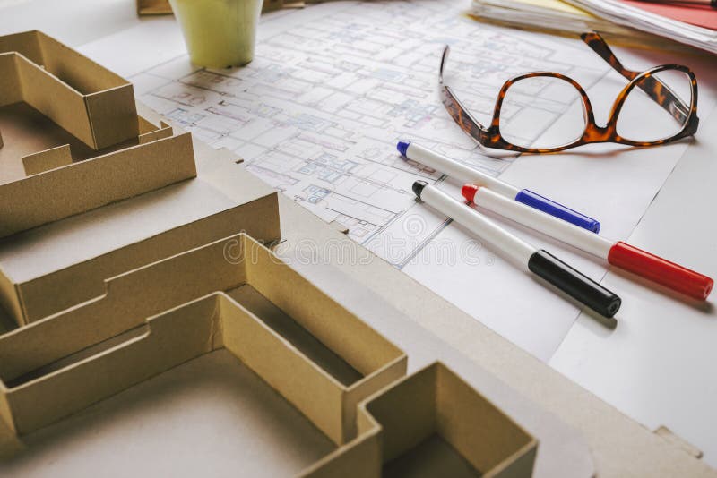 Closeup of Building Model and Drafting Tools on a Construction Plan ...