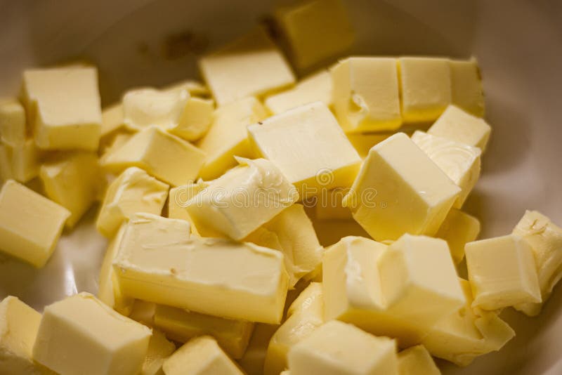 Closeup of a Bunch of Small Cubed Butter Pieces Stock Image - Image of ...