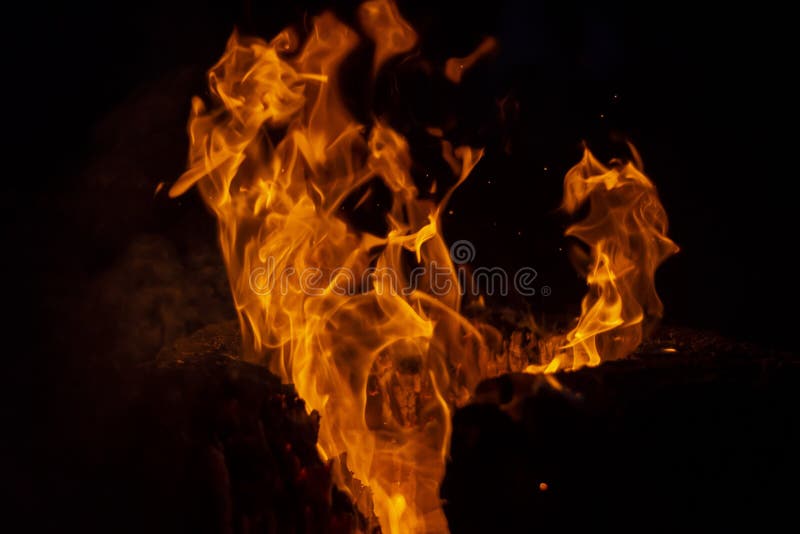 Closeup of a Burning Log Creating a Fiery Background Stock Image ...