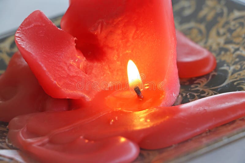 Red candle lit stock photo. Image of design, background - 170600328