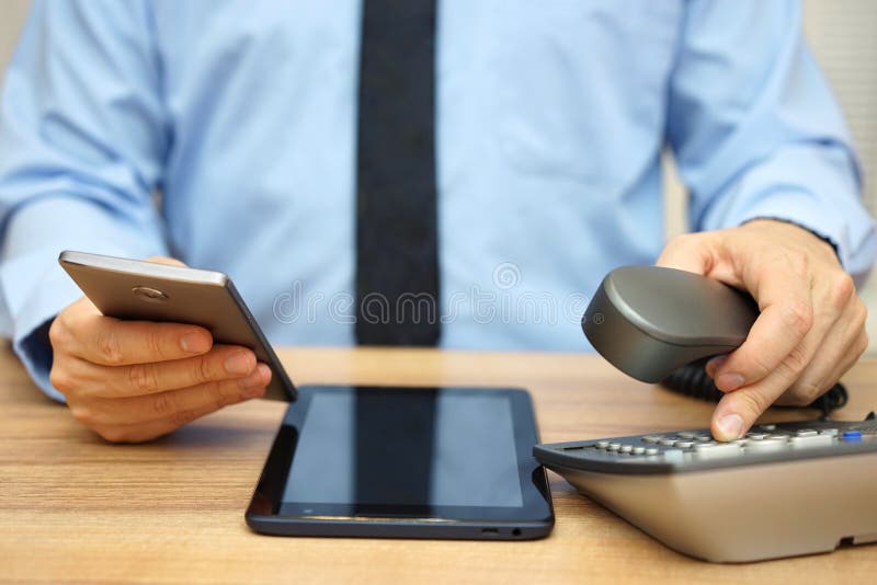 Closeup of Businessman Calling Clients and Using Tablet Computer Stock ...