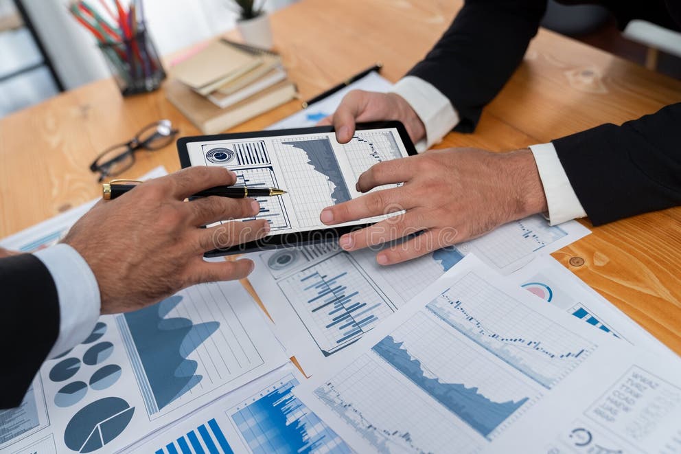 Closeup Busy Analyst Team Discussing Financial Data on Laptop. Fervent ...