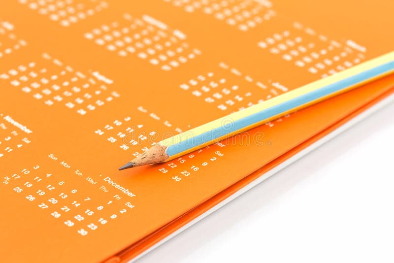 Closeup of Calendar Page and Pencil. Stock Image - Image of desk ...