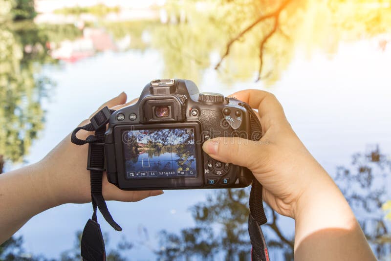 Closeup Camera on Hands Making Nature Photos and Video Stock Photo ...
