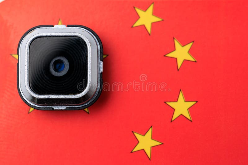 Closeup of Camera Lens on Chinese Flag Highlighting Technology and ...