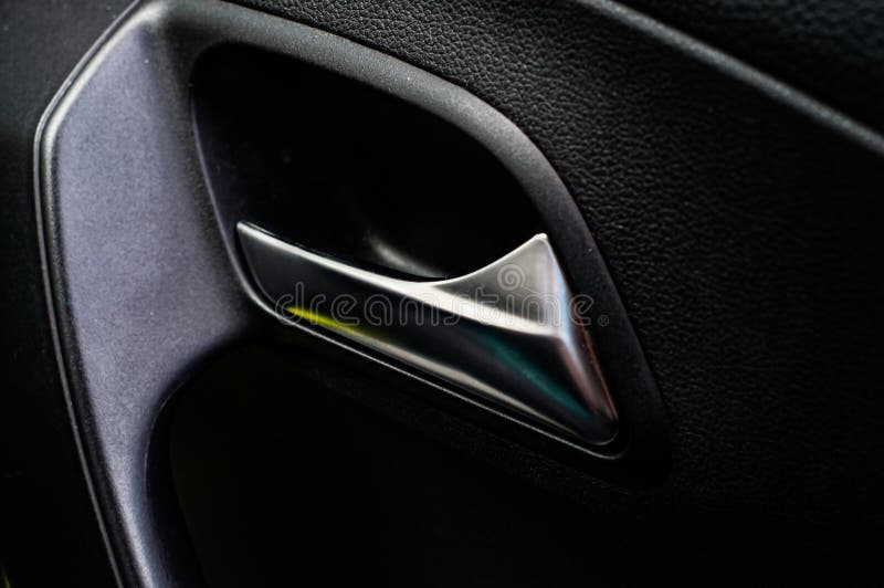 Closeup of Car Door Handle Inside a Car. Car Interior. Car Door Handle ...