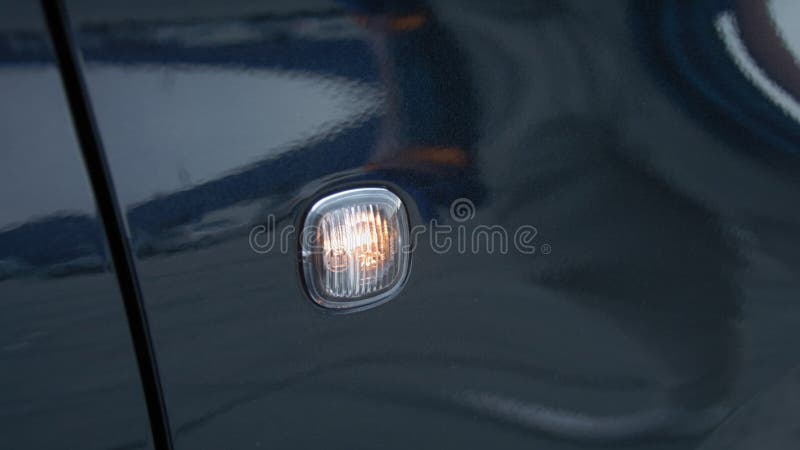 Car Headlight Blinking in Dark. Sports Car Headlight. Shot of Blinking ...