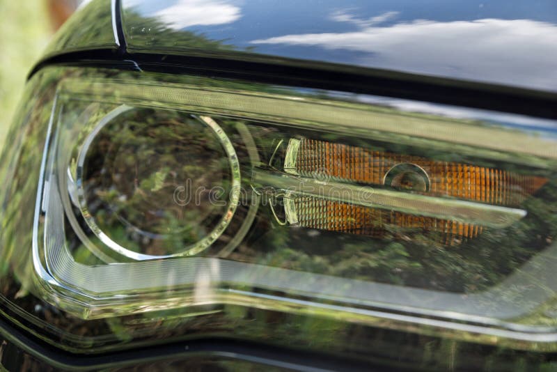 Closeup of Car Headlight, Front View Stock Photo - Image of black ...