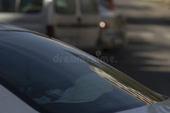 Closeup of a Car Windshield with a Van in the Background Stock Image ...