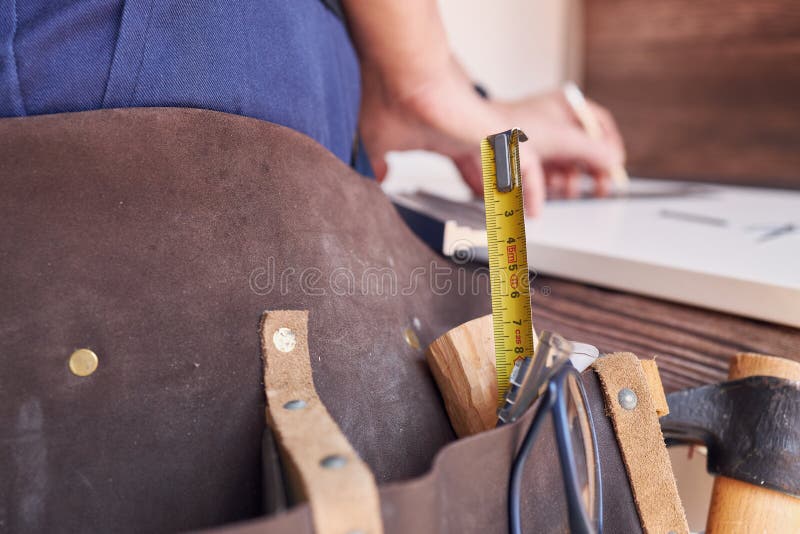 Closeup of Carpenter Tools with Hands Working on Background. No Face ...