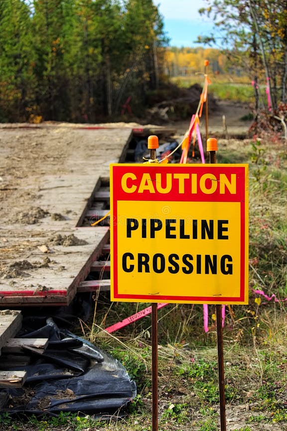 Closeup of a Caution Pipeline Crossing Sign Stock Image - Image of ...