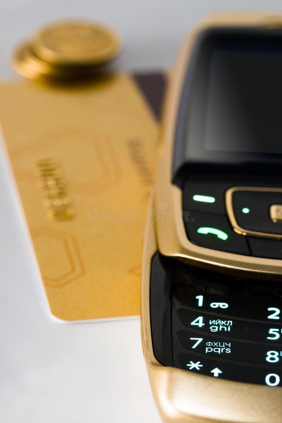 Closeup Cell Phone and Card Stock Photo - Image of gold, service: 4555692