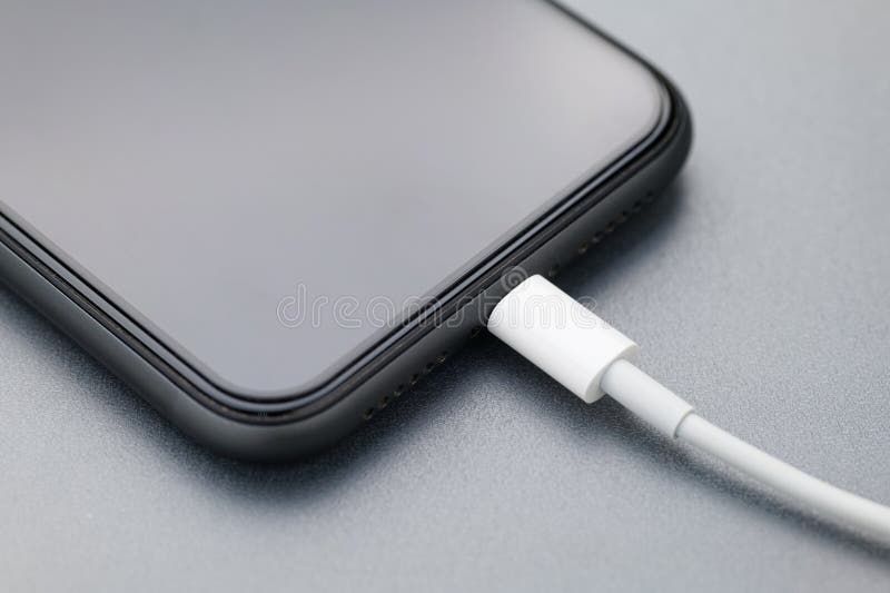 Charging the smartphone stock photo. Image of charging - 331500992