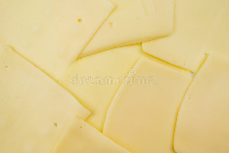 Closeup of Cheese Slices As a Background. Cheese Slices on Background ...