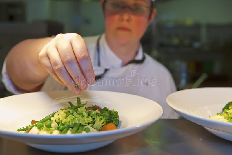 Closeup of Chef Adding Finishing Touch on His Dish Stock Image - Image ...
