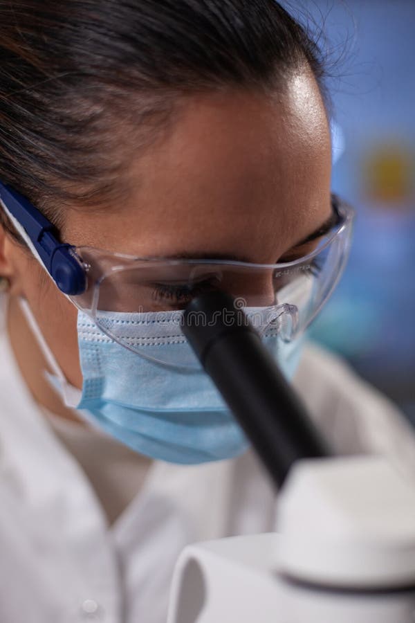 Closeup of Chemist Doctor Analyzing Dna Sample Using Medical Microscope ...