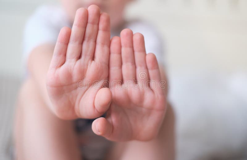 Closeup of Childrens Hands Showing Stop Sign Palms Holding Forward ...