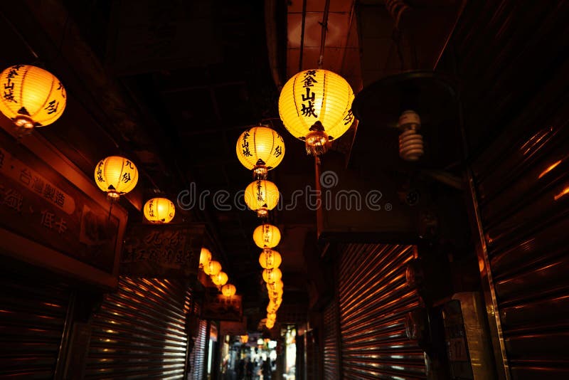 Closeup of Chinese Paper Lantern with Lights Surrounded by Buildings ...