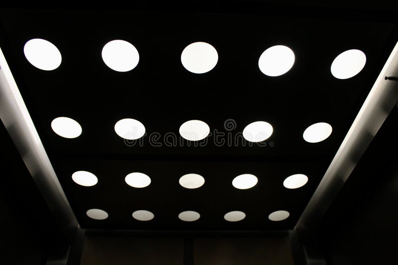 Closeup of Circular Elevator Lights in Ceiling Stock Photo - Image of ...