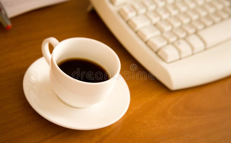 Closeup of Coffee Cup Near Keyboard Stock Image - Image of closeup ...