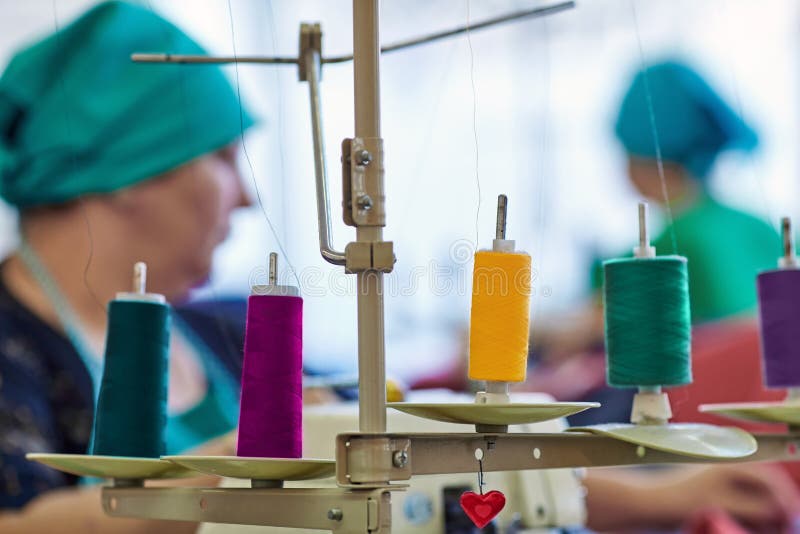 Closeup of Coils with Colored Threads on Sewing Machine Overlock ...