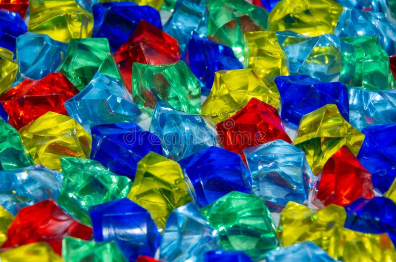 Closeup of Colored Artificial Crystals on the Table Under the Lights ...