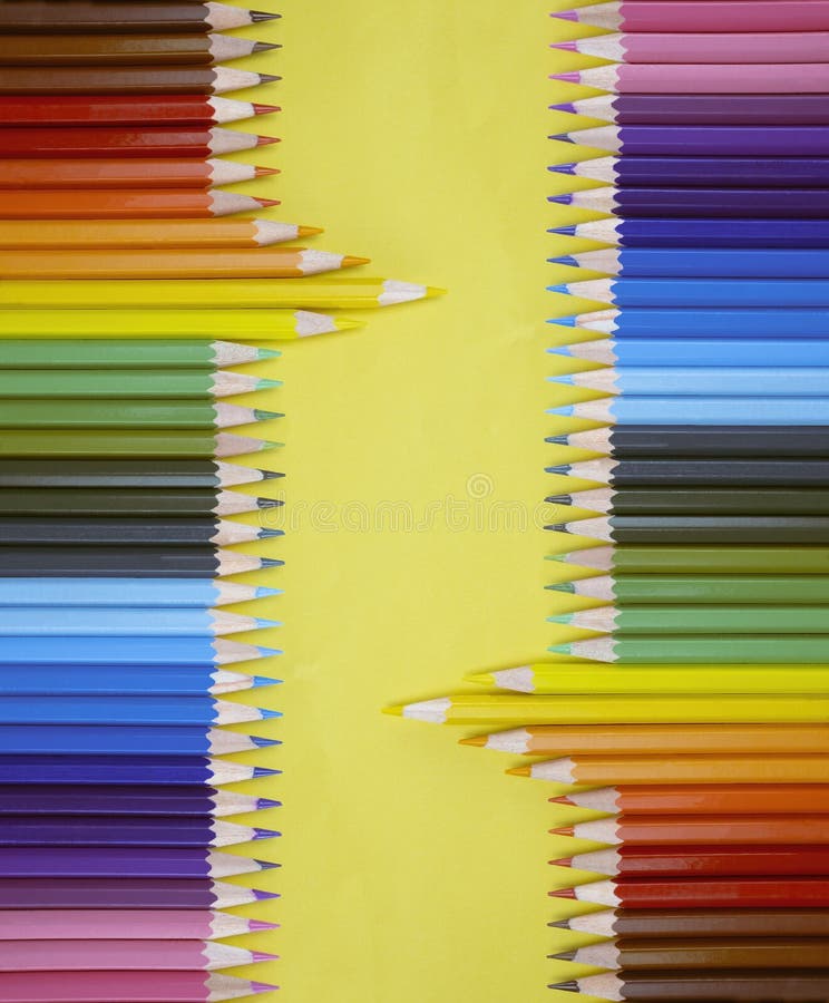 Closeup of Colored Pencils Lined Up in a Row and Abstract Shape on ...