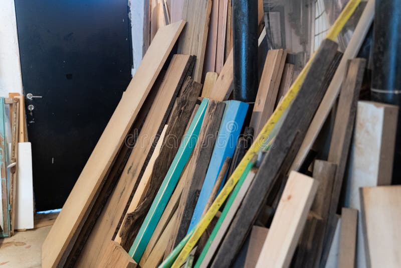 Closeup of Colorful Lumber Leaning on the Wall Under the Lights Stock ...