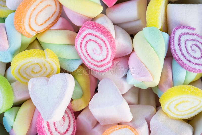 Closeup of Colorful Mini Marshmallows with Candy Background Stock Photo ...