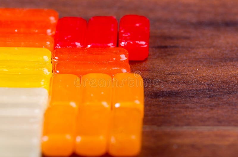 Pile Colorful Rectangular Hard Candy Lying Wooden Surface Stock Photos ...