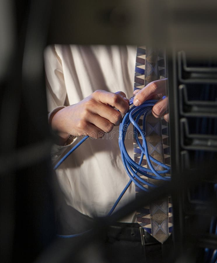Closeup of a a Computer Technician Holding an Ethernet Cable Stock Photo - Image of hardware ...