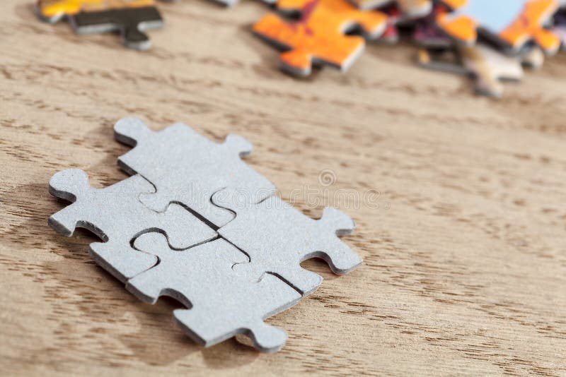 Closeup of Connected Jigsaw Puzzle Pieces Stock Photo - Image of ...